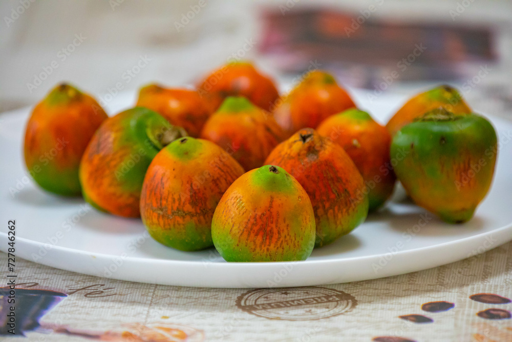 Rare and exotic fruit of the peach palm (Bactris gasipaes), typical ...