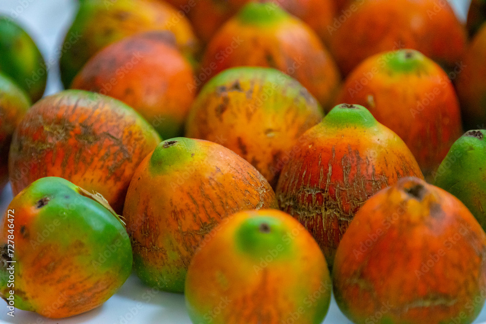 Rare and exotic fruit of the peach palm (Bactris gasipaes), typical ...