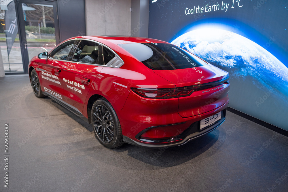 new red BYD Han EV 3.95, side view, Electric Vehicle Chinese ...