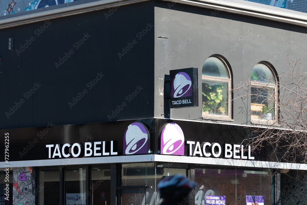 exterior facade and sign of Taco Bell, a fast food restaurant chain ...