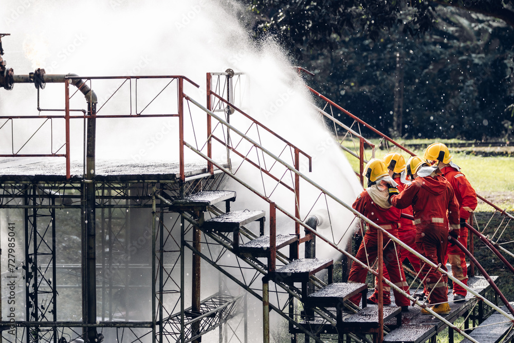 Firefighter Concept. Several firefighters go offensive for a fire ...