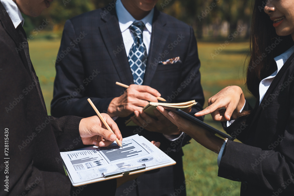 Group of asian business people presenting environmentally friendly ...