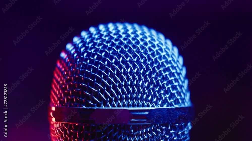 Vidéo Stock Microphone head rotating with blue and red light. Concert ...
