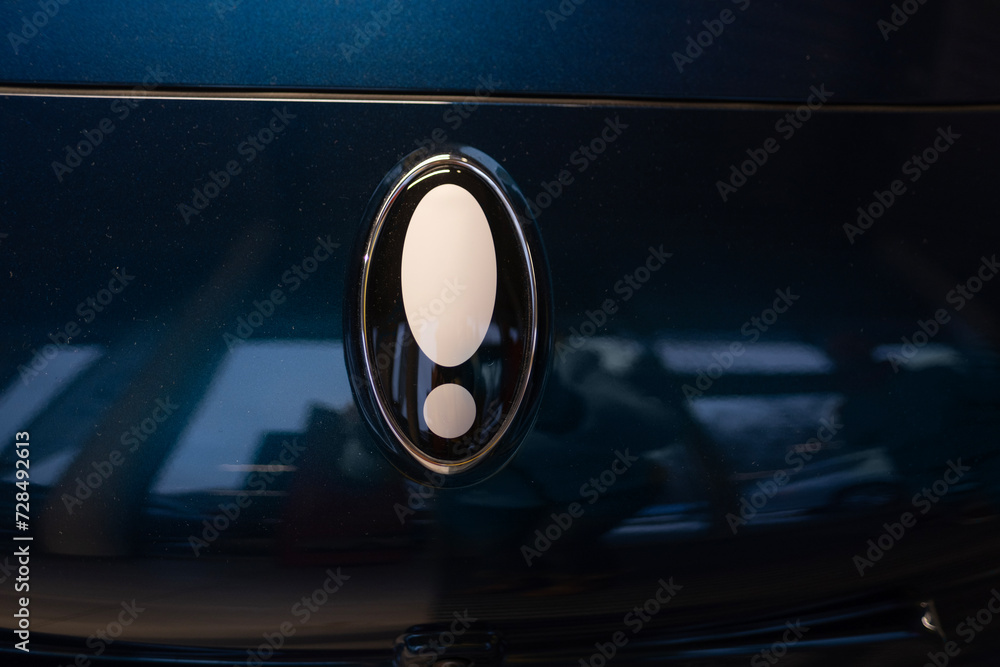 Logo on cap close-up, blue electric car GWM ORA 03, automobile details ...
