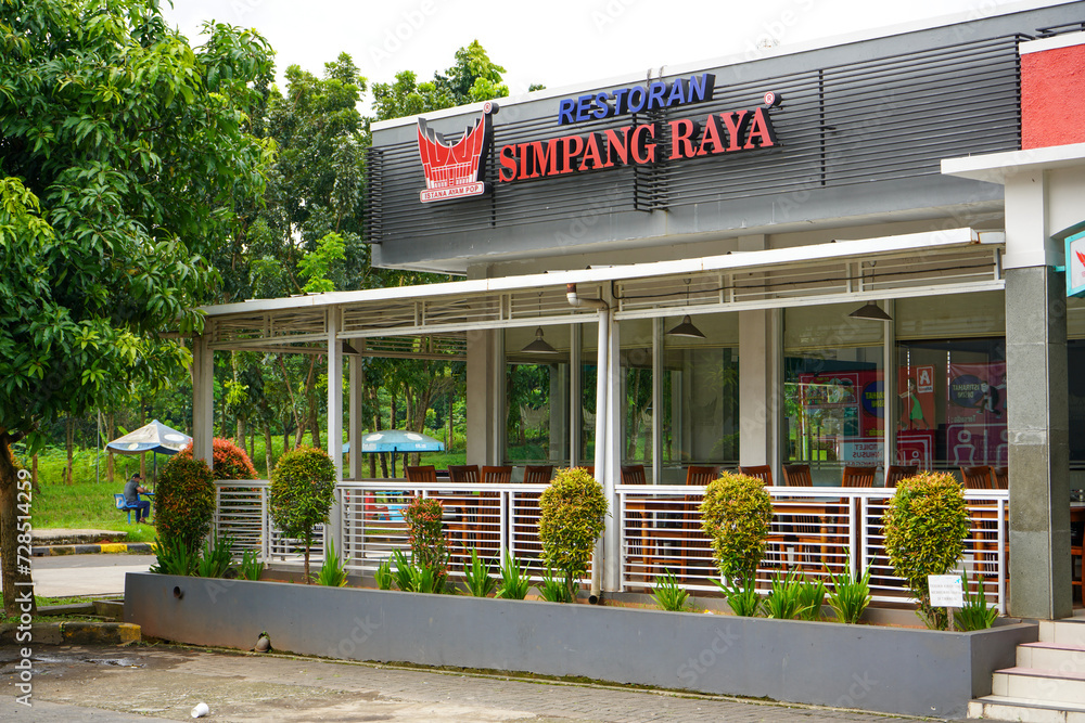 Simpang Raya Padang restaurant in front with a glass display case ...