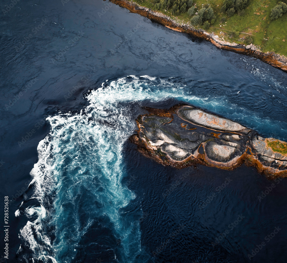 Whirlpool and splash in Saltstraumen, a small strait in Norway with one ...