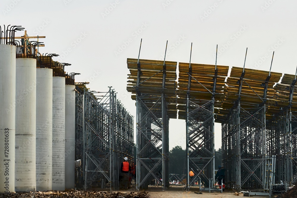 A large-scale construction project of a highway bridge with concrete ...