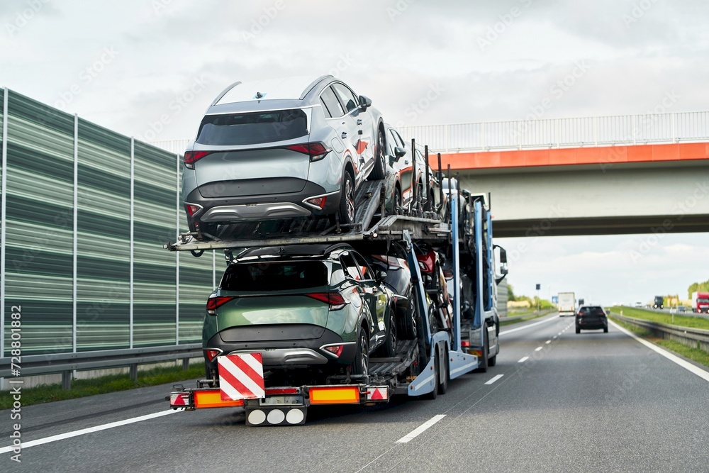 Roadside assistance transports a car with a breakdown on the road ...