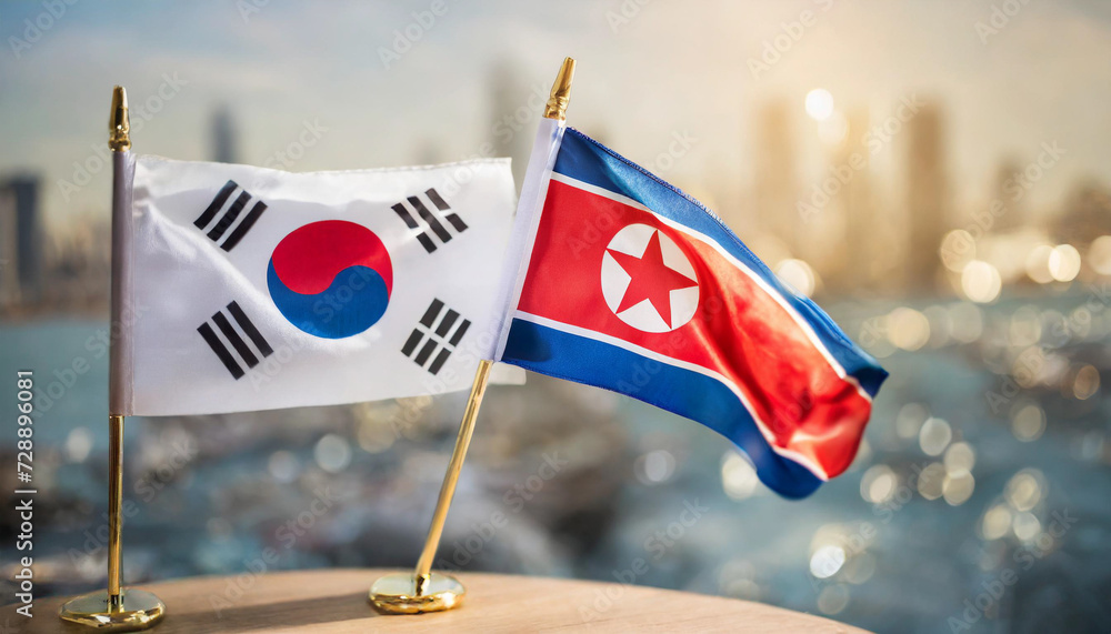 Flags of North and South Korea waving side by side, symbolizing the ...
