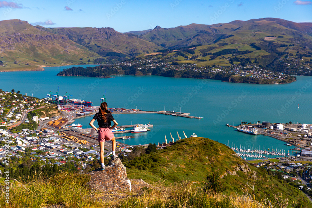 pretty hiker girl enjoying the panorama of lyttelton after finishing ...