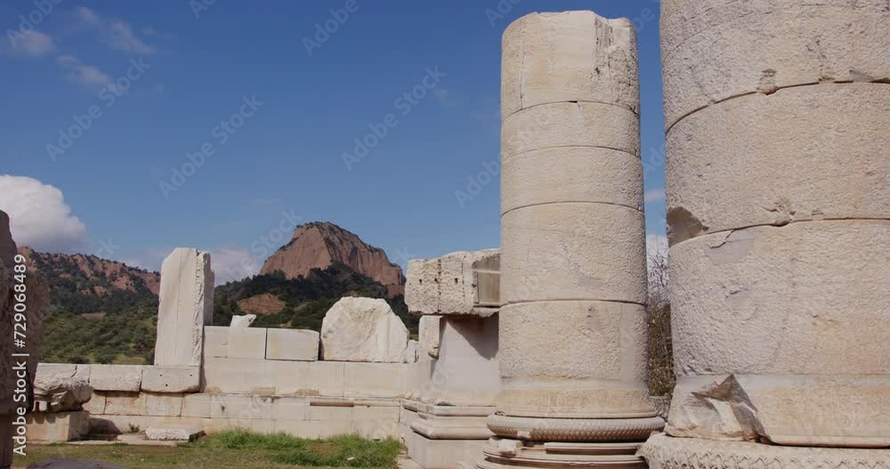 Ancient pillars of the Temple of Artemis in front of Tmolus Mountain in ...