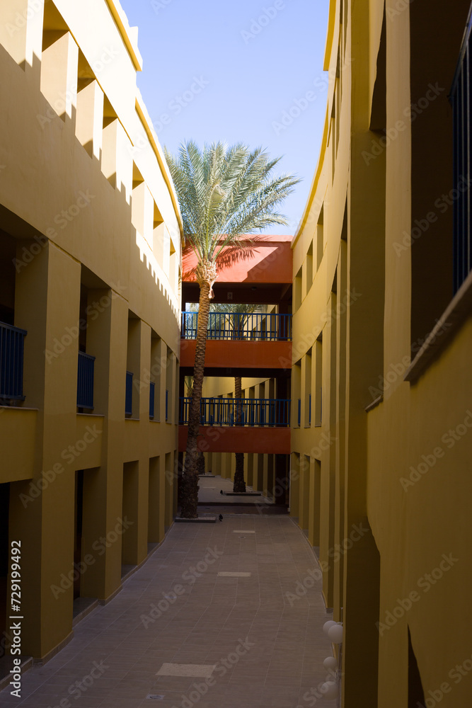 Connecting bridge between two buildings in a hotel with long corridors ...