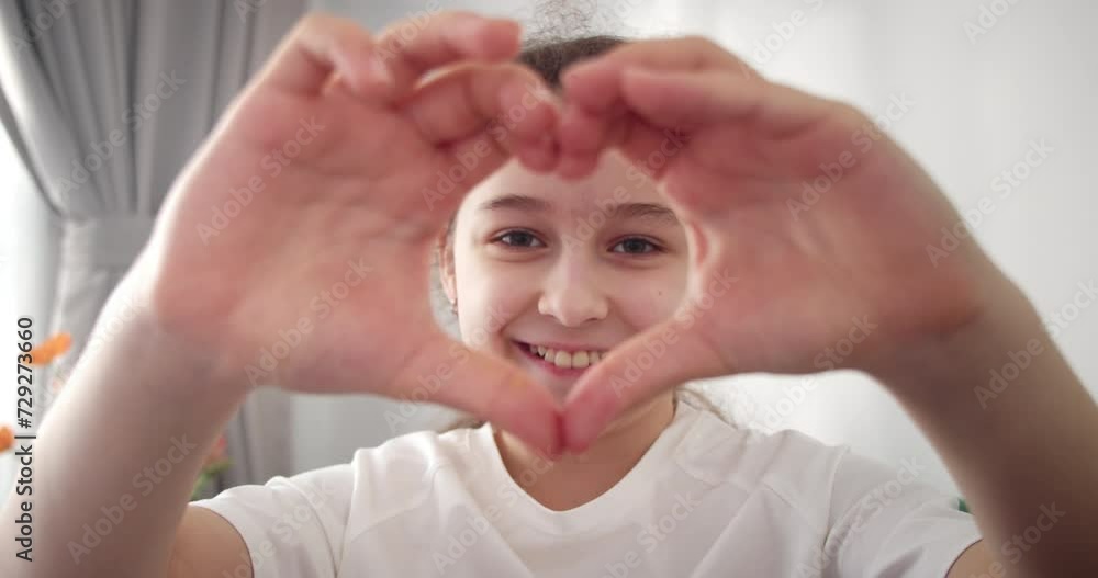 Beautiful happy little cute child face adorable girl kid seen through ...