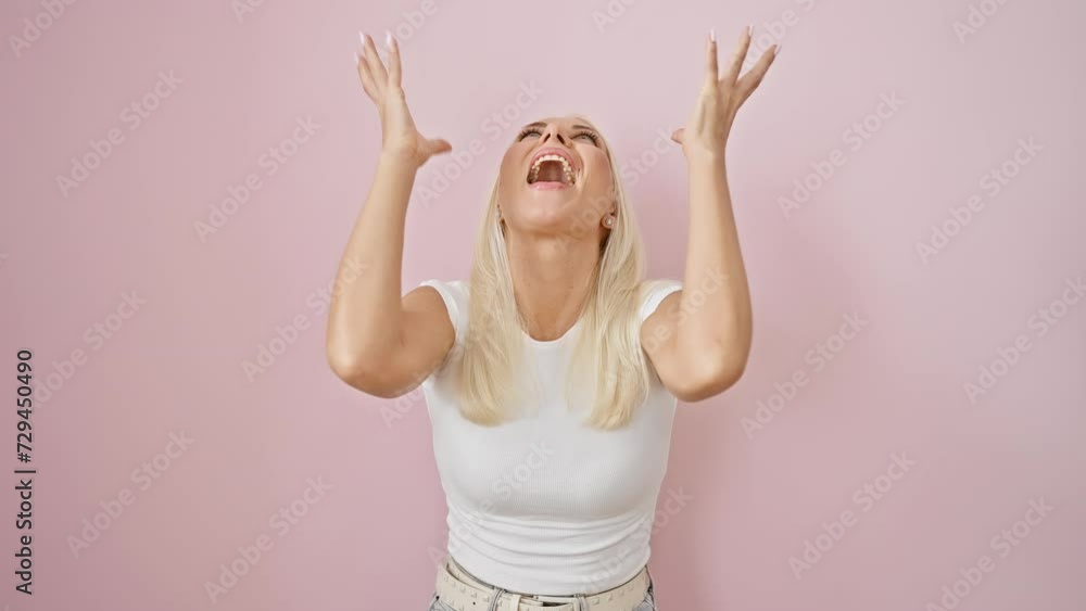 Crazy-mad young blonde woman standing tall, yelling with raw ...