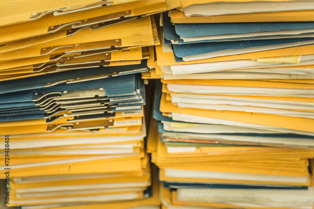 Still life of stacks of old documents and folders ready to be shredded ...