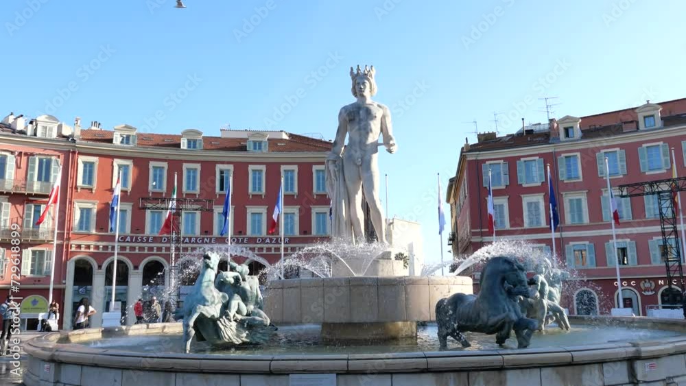 Dynamic scenes at Place Masséna near the Fontaine du Soleil, with the ...
