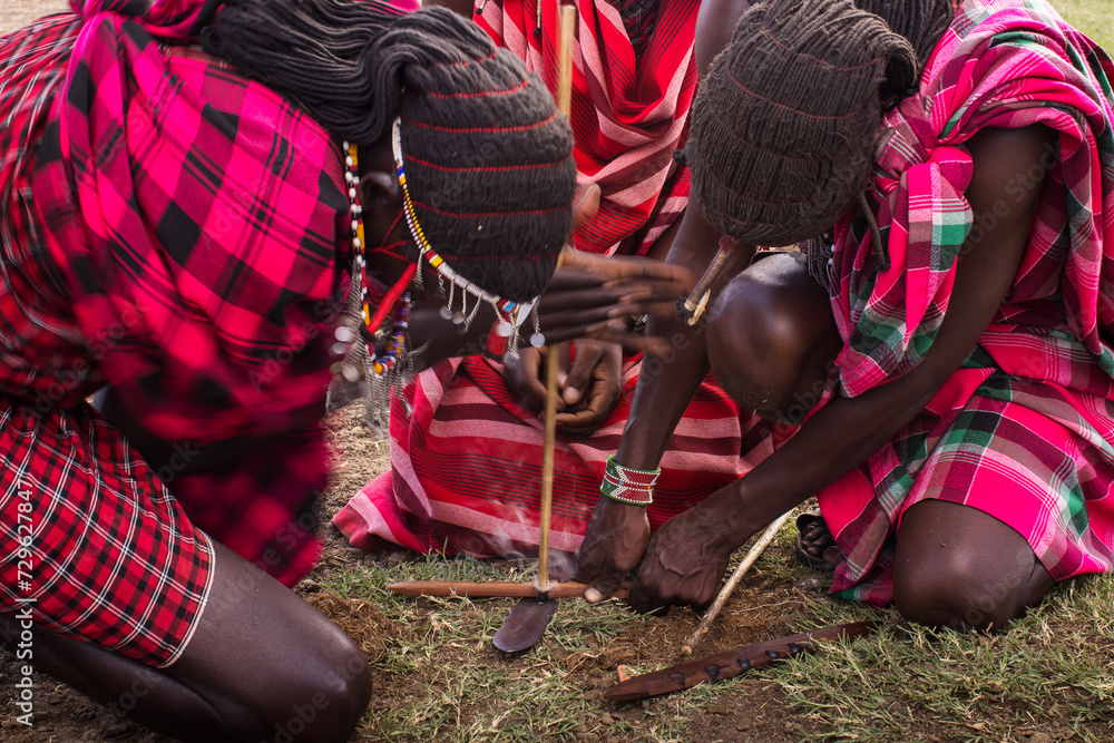 Maasai People making fire in traditional way, Kenya Stock Photo | Adobe ...