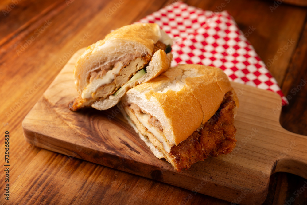 Mexican Torta de Milanesa. Sandwich made with bolillo bread, telera or ...
