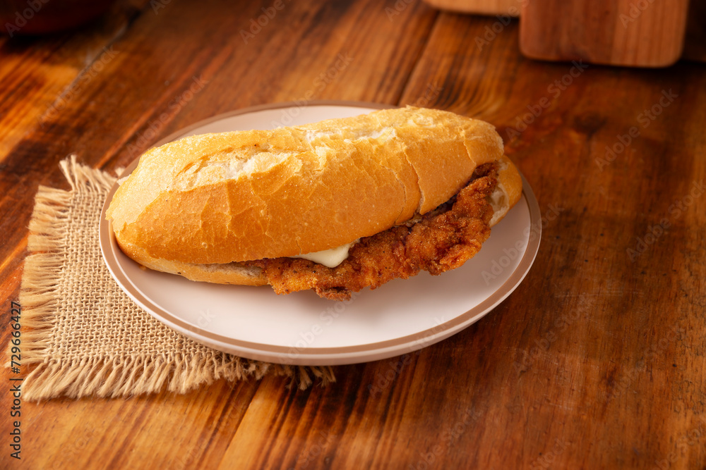 Mexican Torta de Milanesa. Sandwich made with bolillo bread, telera or ...