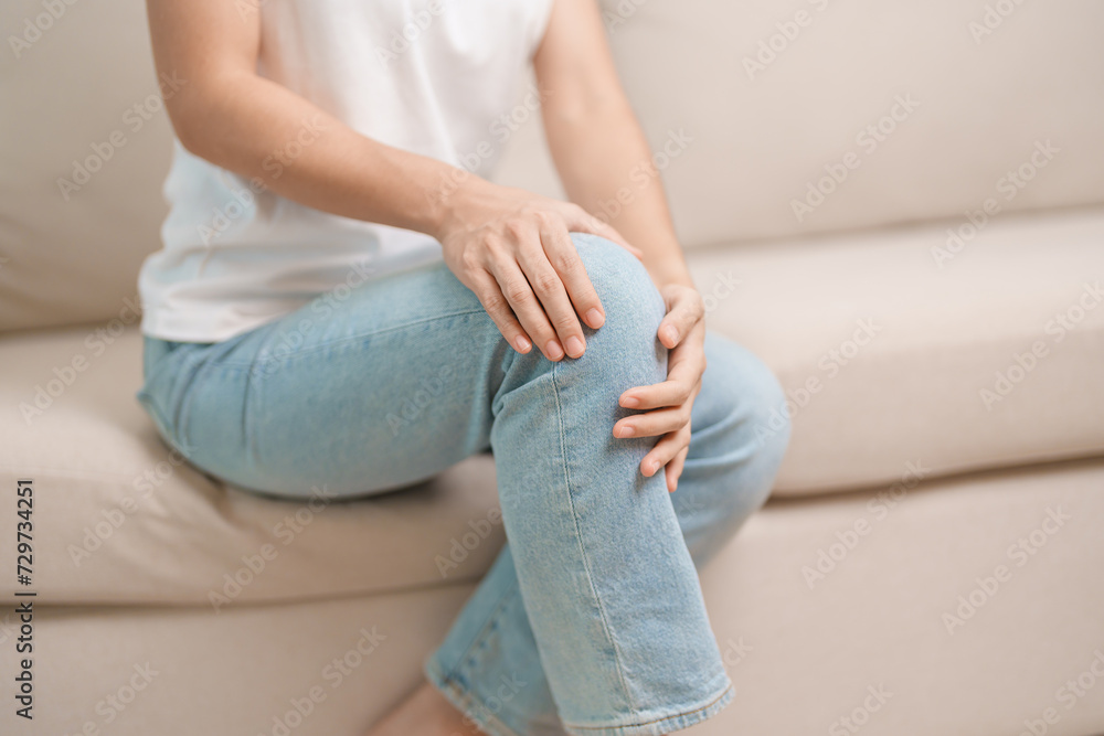 woman having knee ache and muscle pain due to Runners Knee or ...