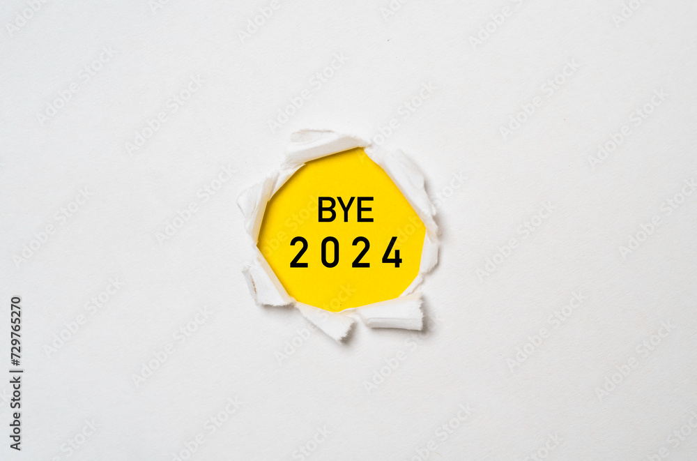 Bye 2024 wording on yellow background and white punch paper for good ...