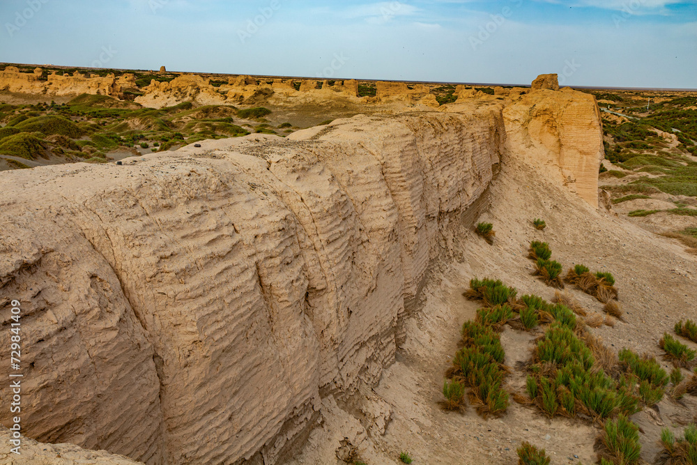 A view of an ancient watchtower built by sand and stones on a dessert ...