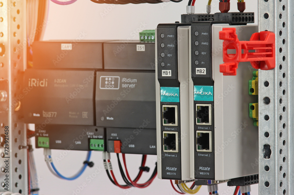 Electronic control modules for apartment automation are installed in an ...