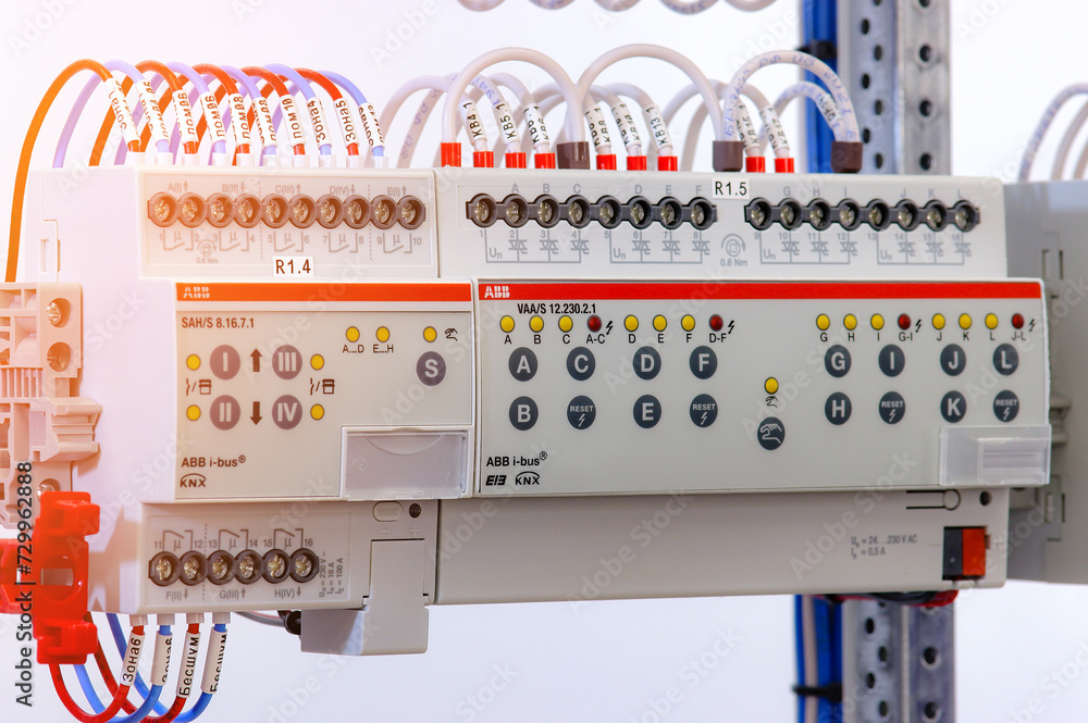 Electronic control modules for apartment automation are installed in an ...