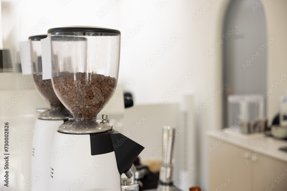 grinder coffee machine. Coffee beans inside the machine hopper of ...