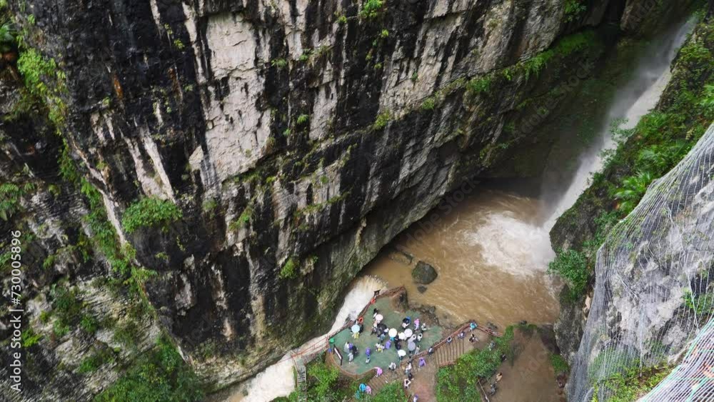 Waterfall in rainy season. Fast flowing waterfall river between canyon ...