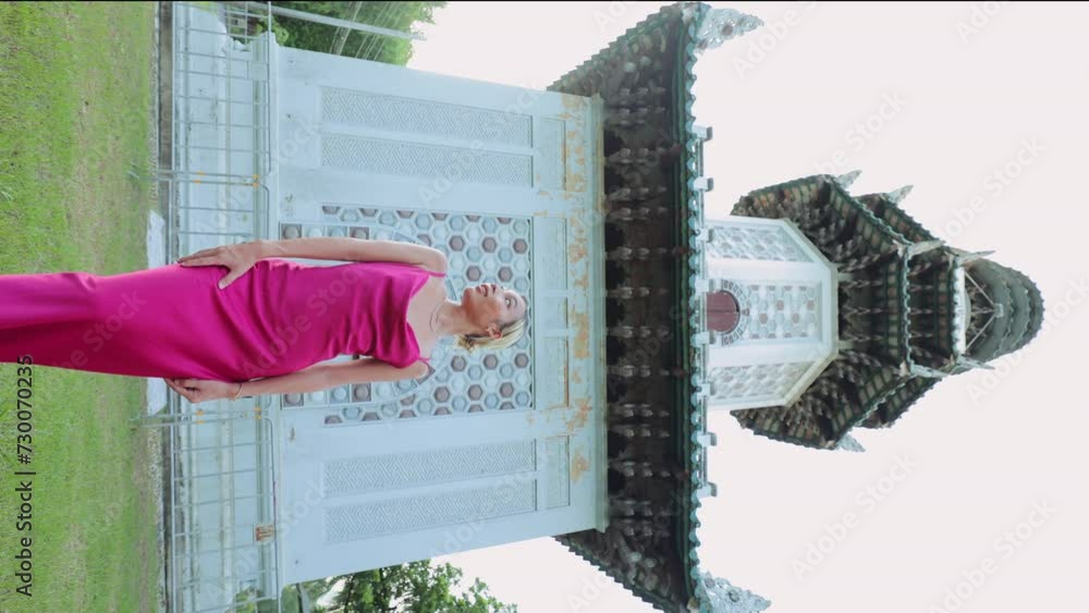 Vertical Video Elegant Asian Lady Dressed To Impress Strikes Poses