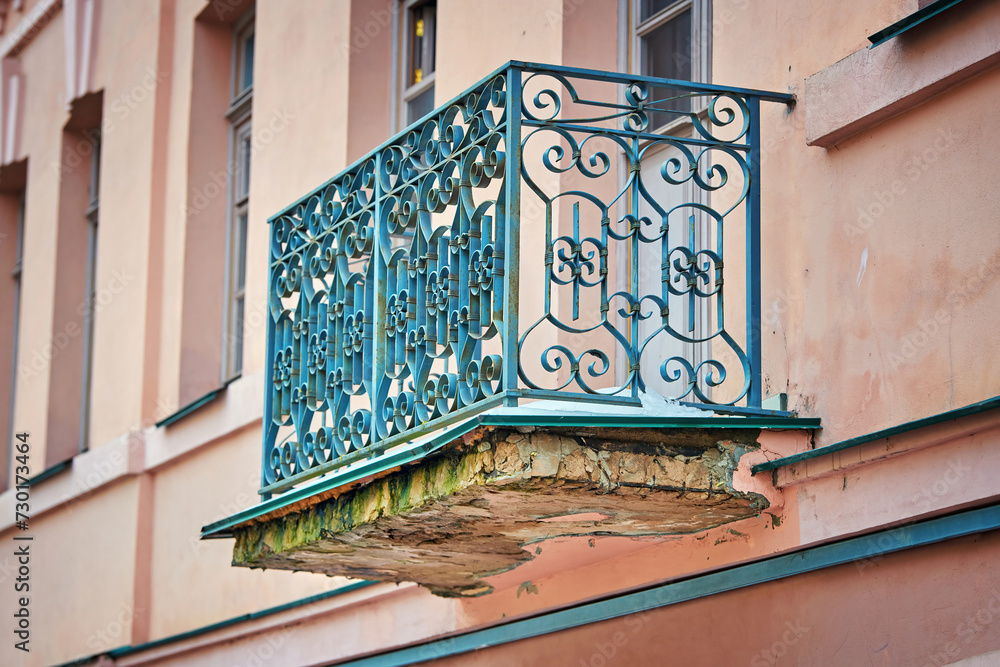 Damaged balcony. Emergency balcony, with cracked concrete. Broken ...