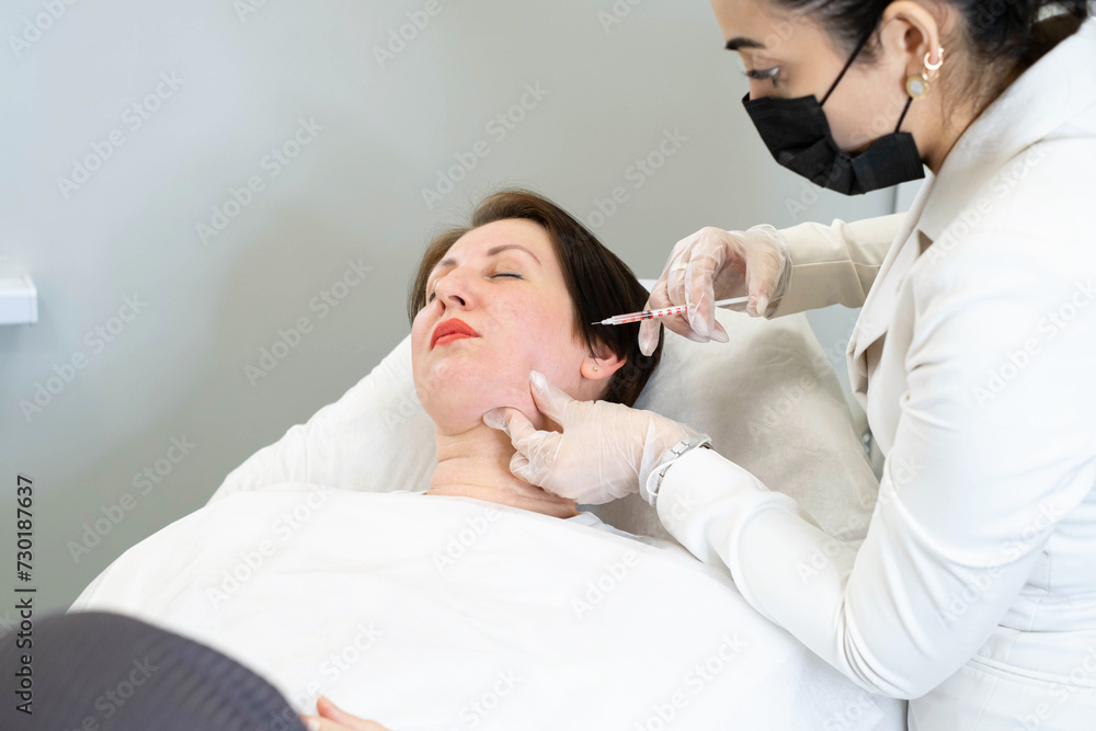 Lipolytic injection to reduce double chin, precision in care ...