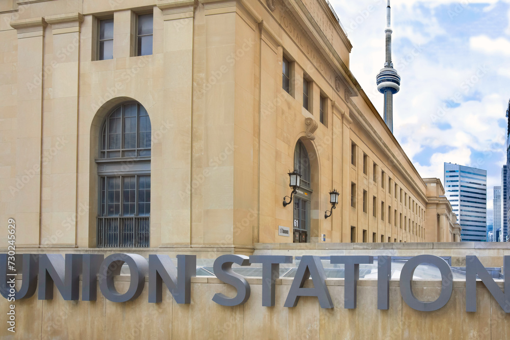 Union Station sign at Toronto Union Station with CN Tower in background ...