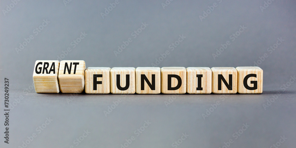 Grant funding symbol. Concept words Grant funding on beautiful wooden ...