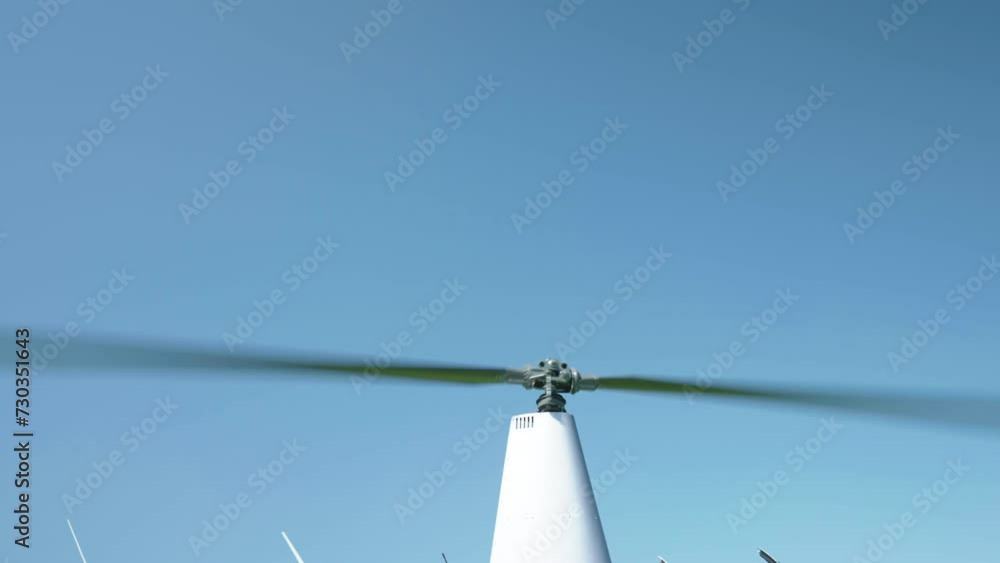 Vidéo Stock Helicopter main rotor blades rotating against blue sky ...
