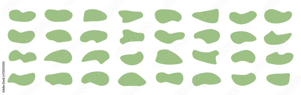 Abstract green irregular blot form. Random shapes of cube, pebble ...