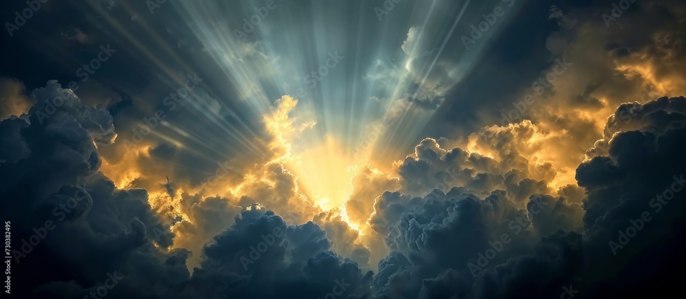 Glorious rays illuminate a dark sky in a heavenly spectacle. Stock ...