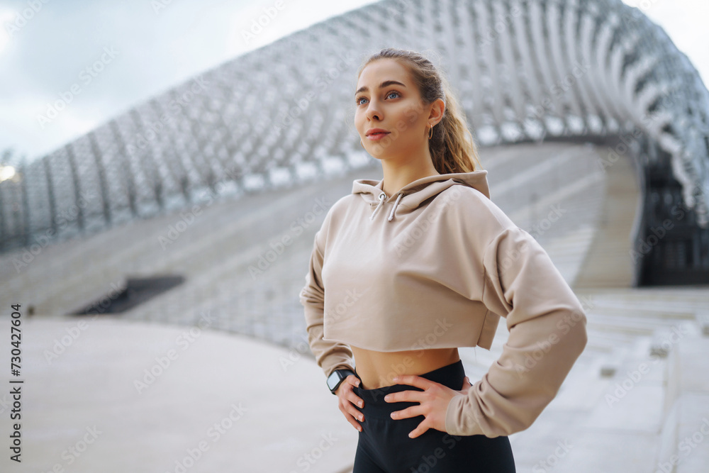 Beautiful young woman out for her morning workout. Getting fit is my ...