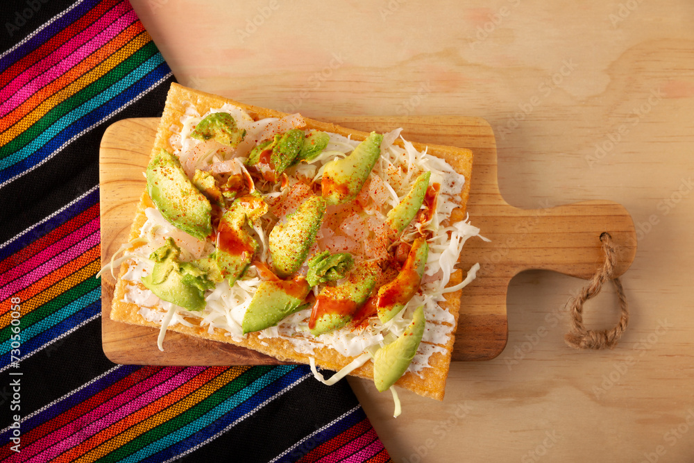 Fried wheat flour toast with pickled pork skin, sour cream and ...