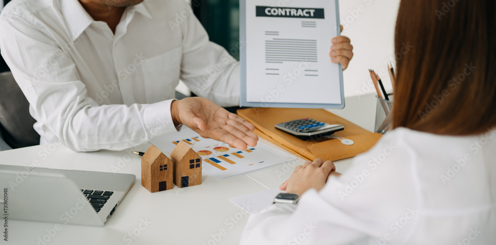 balancing the property sector The real estate agent is explaining the ...