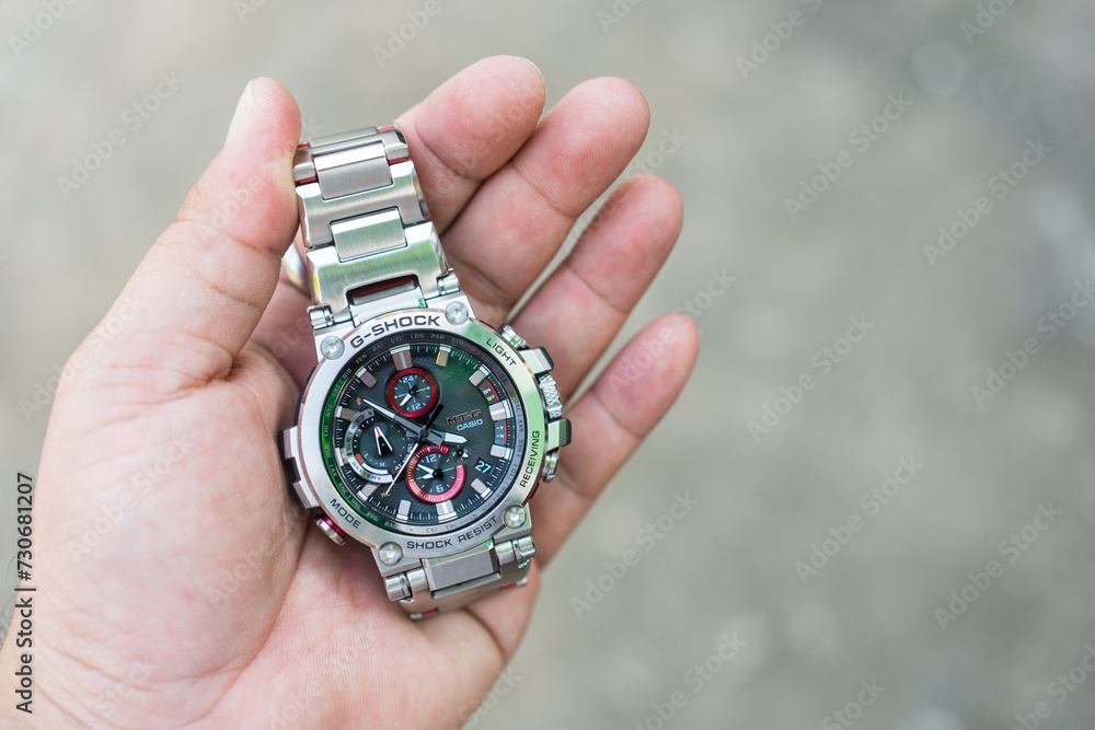 Samut Prakan, Thailand - February 8, 2024 : A hand holding Casio G ...