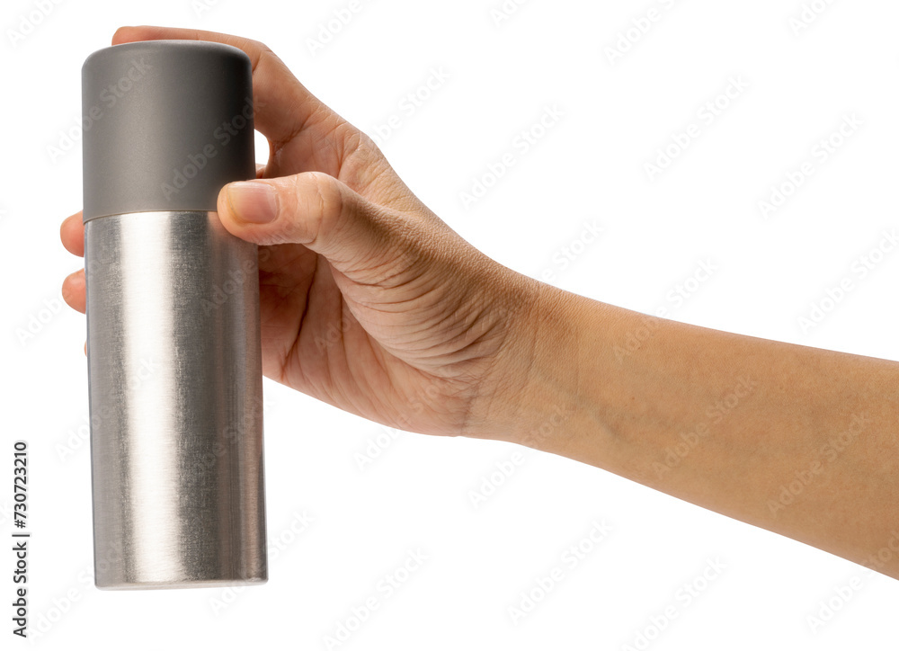 Female hand holding a spray can on white background, Silver perfume ...