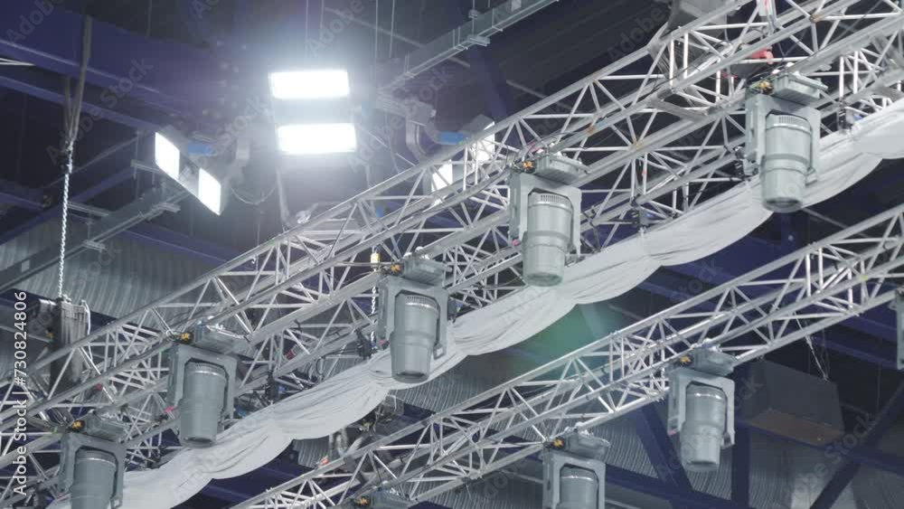 Ceiling of arena equipped with adjustable lamps for optimal visibility ...