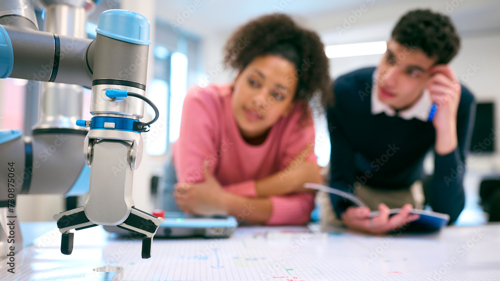 Male And Female College Or University Engineering Students In Robotics ...