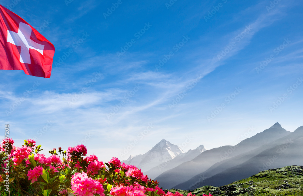 Schweizer Berge mit Schweizer Fahne und Alpenrosen Stock Photo | Adobe ...