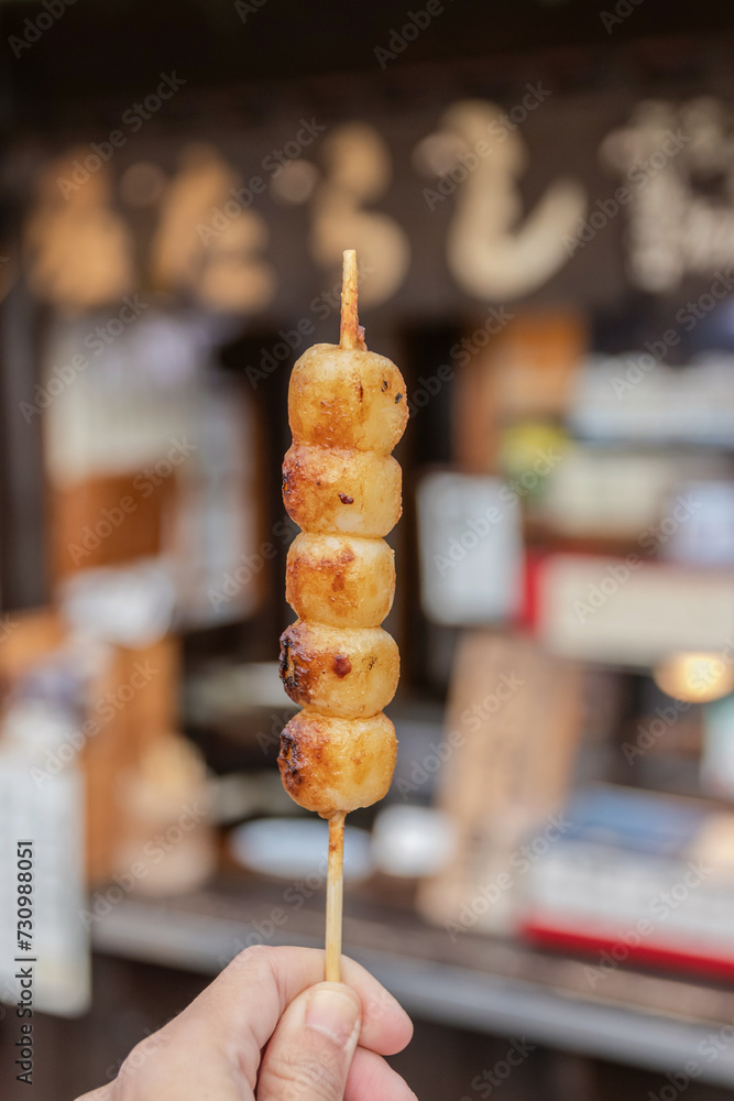 Mitarashi Dango are traditional Japanese rice dumplings on a bamboo ...