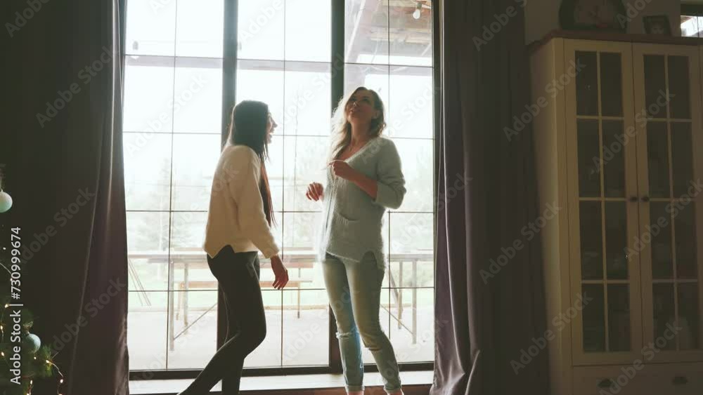 two joyful happy women friend, actively communicating talking loudly ...