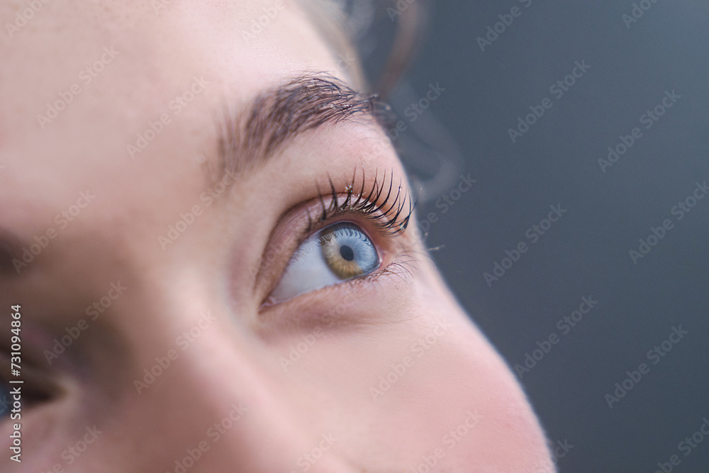 Eye of a beautiful young girl with heterochromia, macro photography of ...
