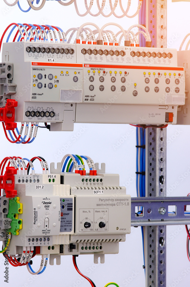 Electronic control modules for apartment automation are installed in an ...